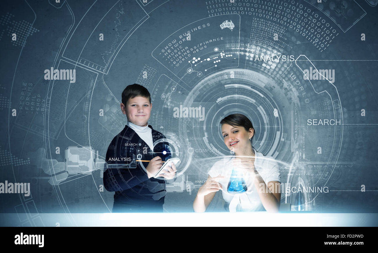 Young teacher and school boy at chemistry lesson Stock Photo - Alamy