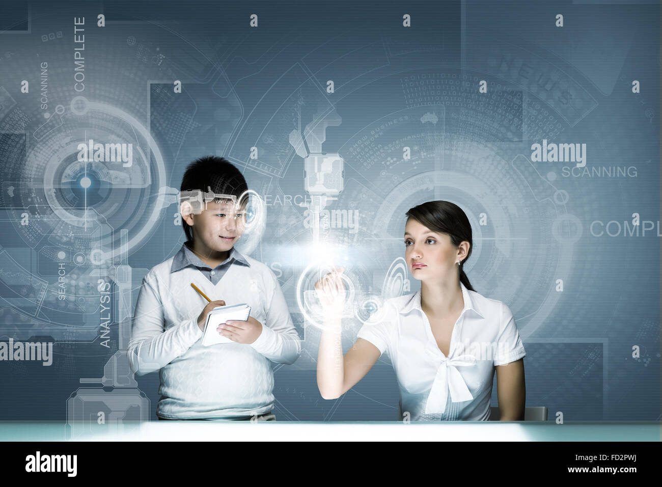 Young teacher and school boy at computing lesson Stock Photo - Alamy
