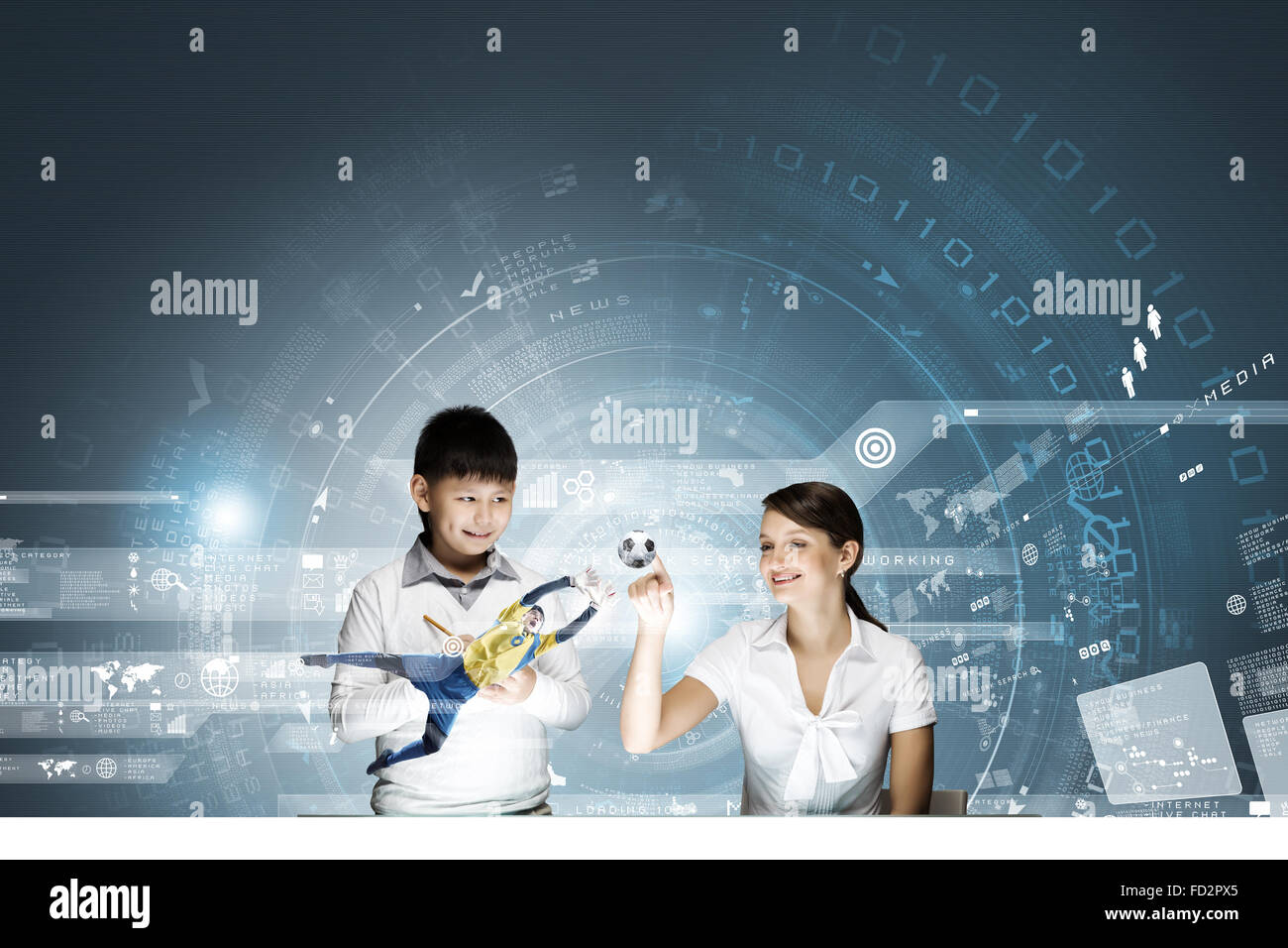 Young teacher and school boy at computing lesson Stock Photo - Alamy