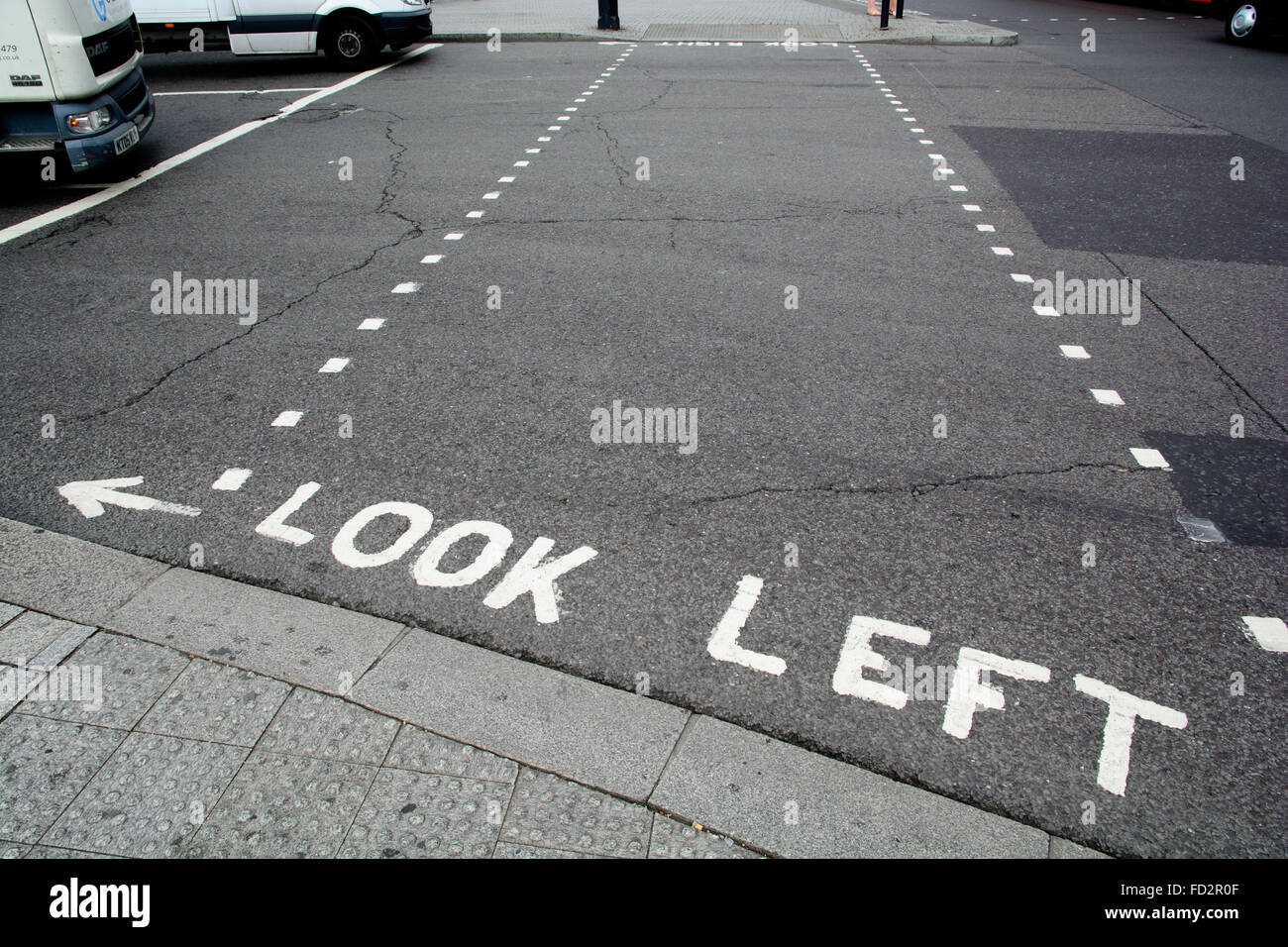Look left warning pedestrian zebra hi-res stock photography and images ...