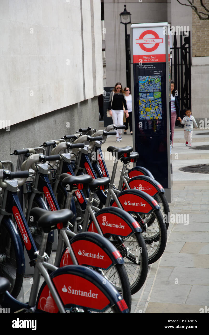 Rental bikes in London with a payment machine Stock Photo - Alamy