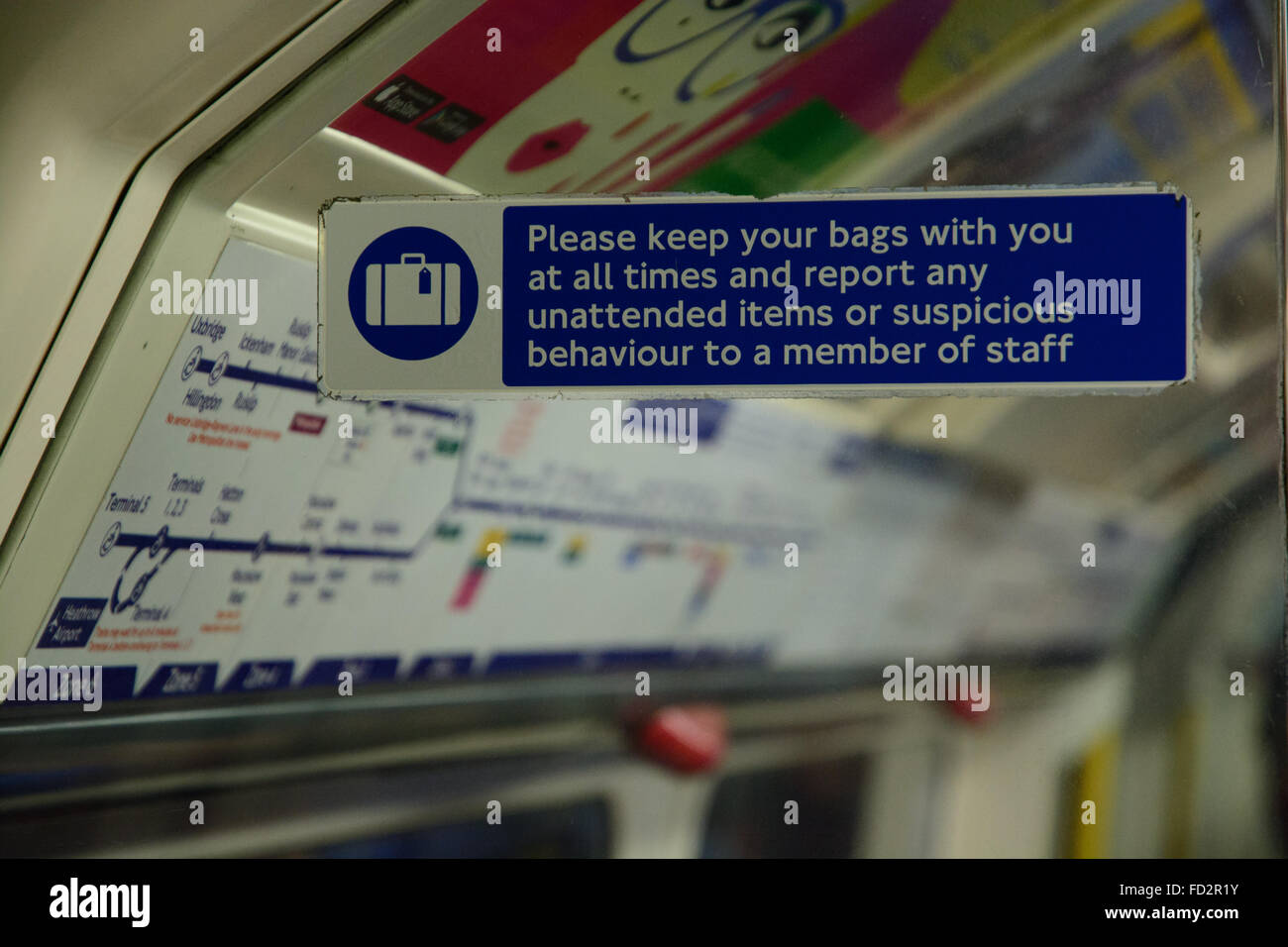 Warning sign in underground train in London to watch out for unattended ...