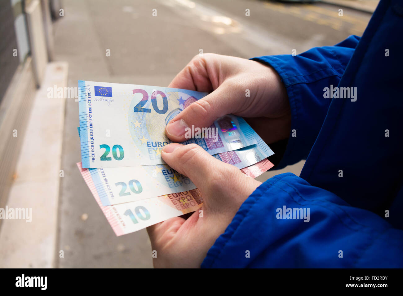 Money on the street hi-res stock photography and images - Alamy
