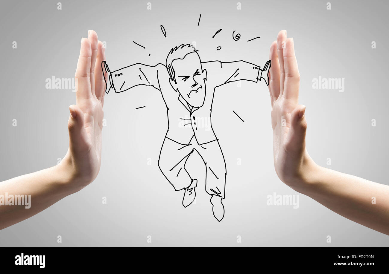 Close up of human hand catching running away businessman Stock Photo ...