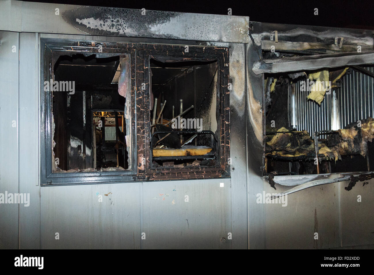 Munich, Germany. 27th Jan, 2015. Burned down living containers that got ...