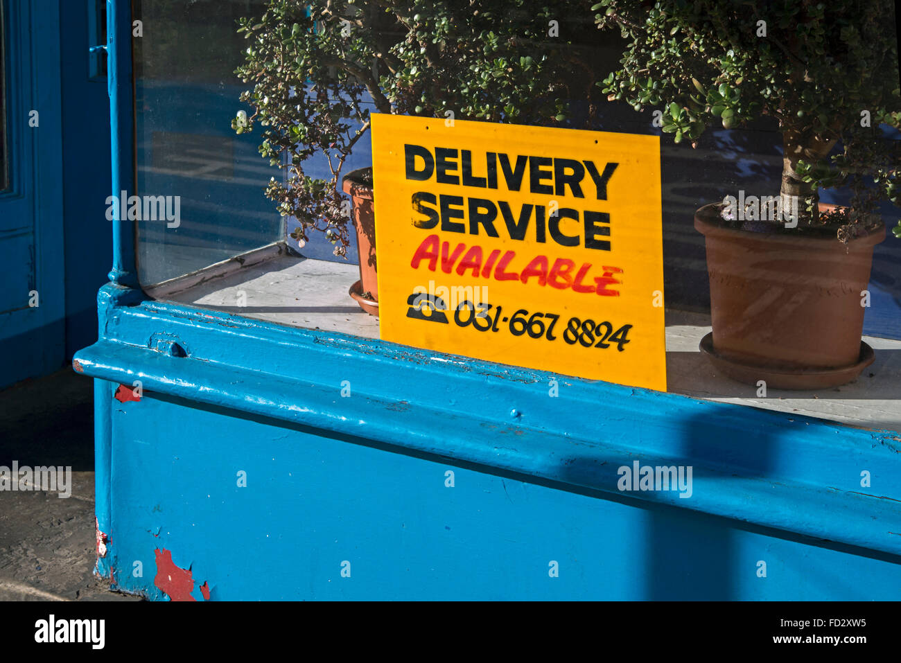 Delivery service sign in the window of a Chinese Takeaway in Edinburgh ...