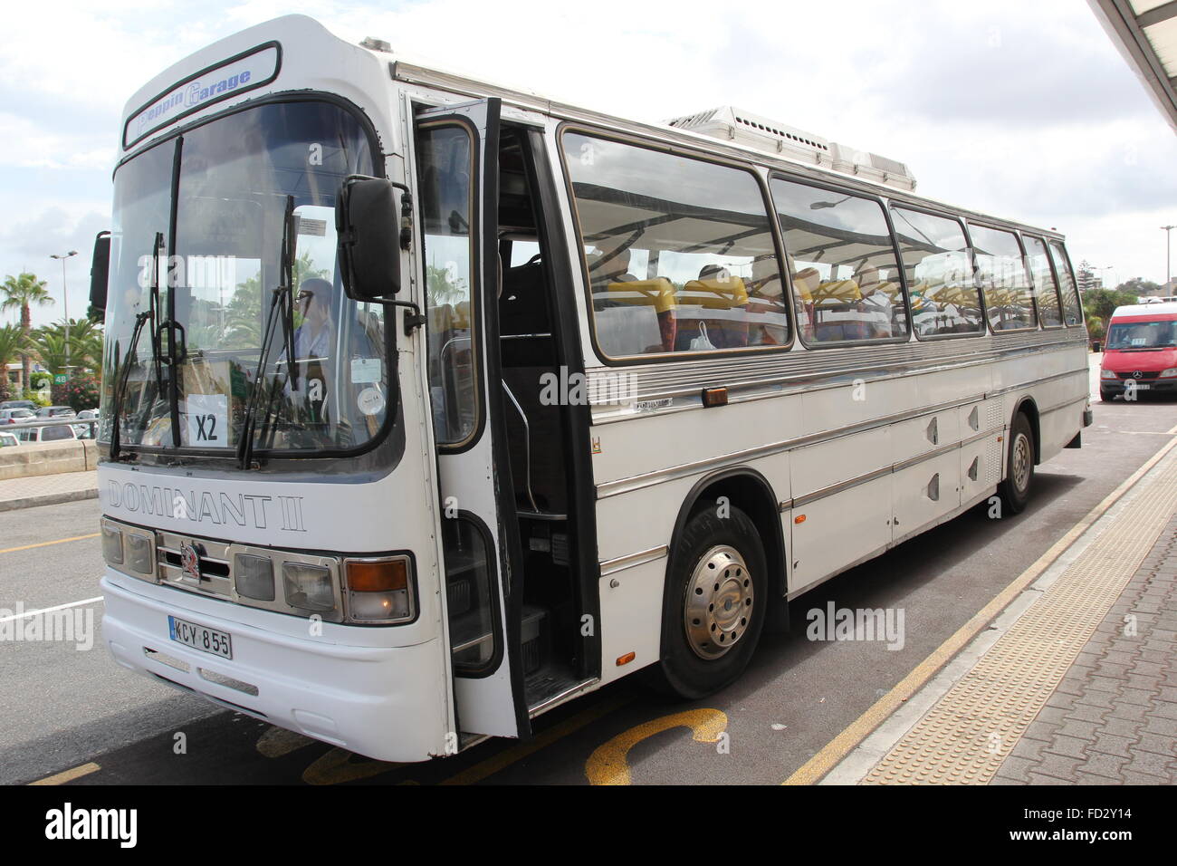 A traditional Malta bus in white colour Stock Photo - Alamy