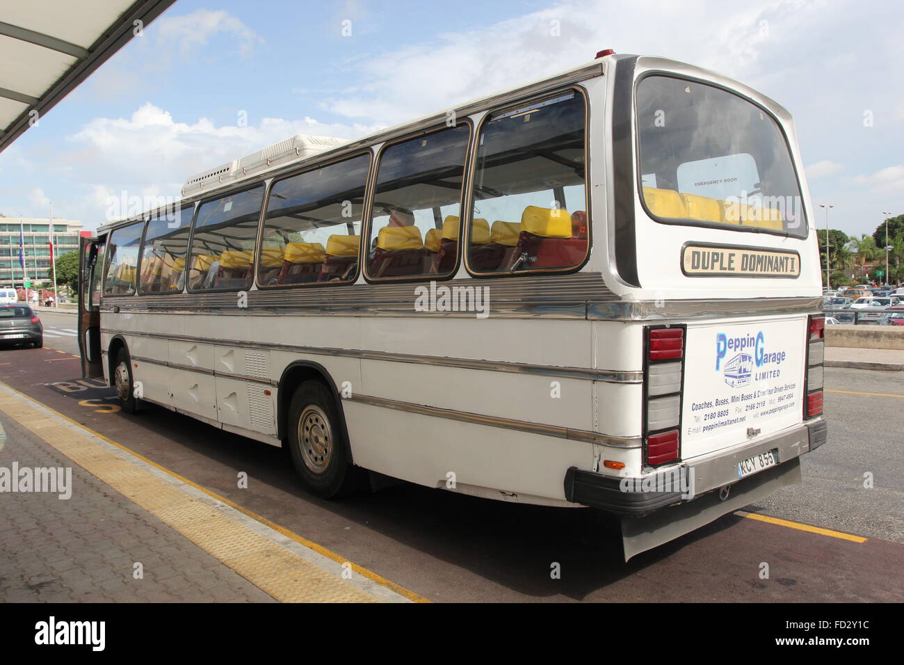 A traditional Malta bus in white colour Stock Photo - Alamy