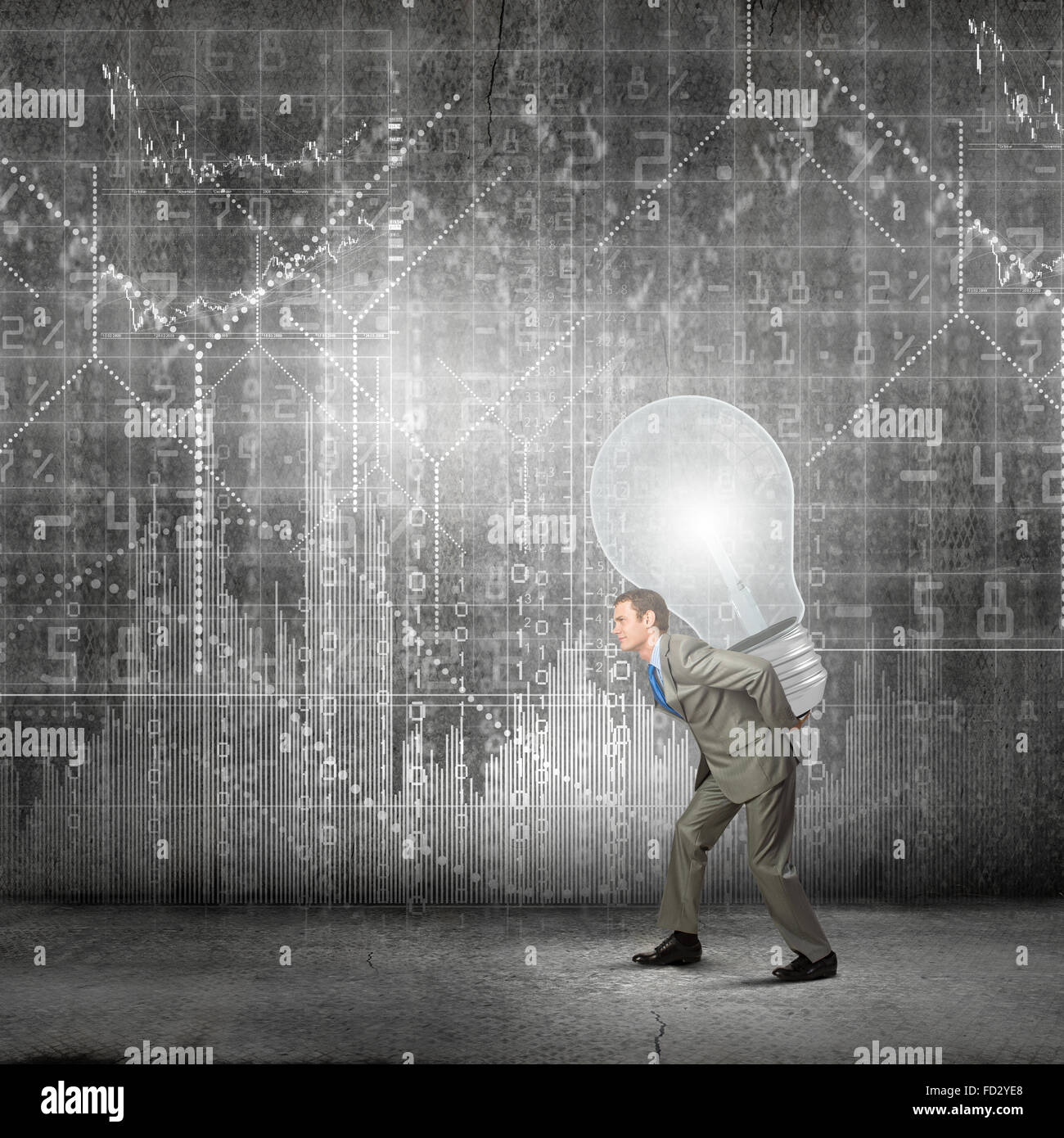 Young businessman carrying light bulb on back Stock Photo - Alamy