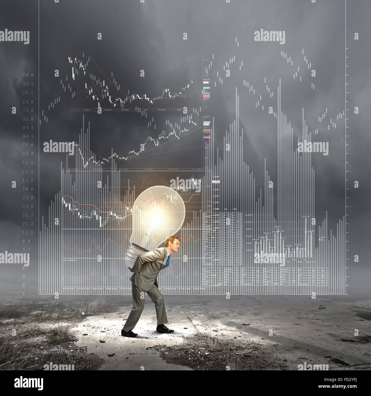 Young businessman carrying light bulb on back Stock Photo - Alamy