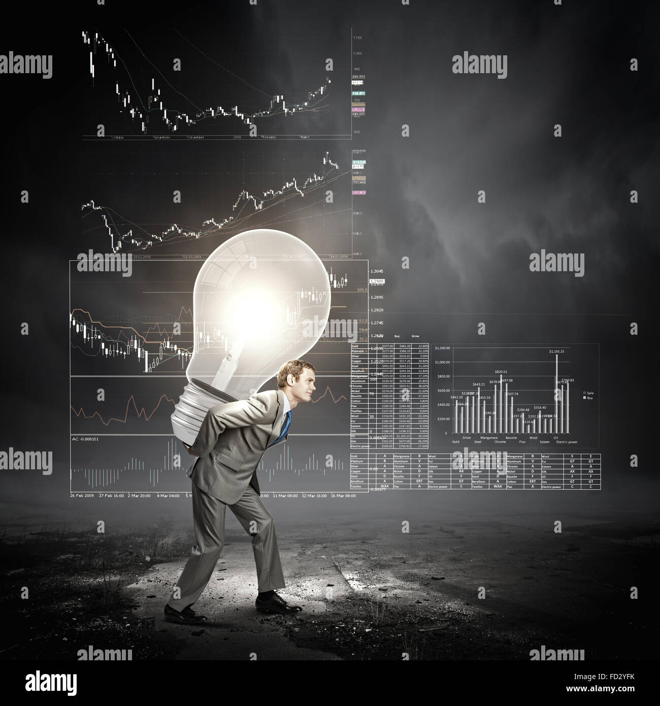 Young businessman carrying light bulb on back Stock Photo - Alamy
