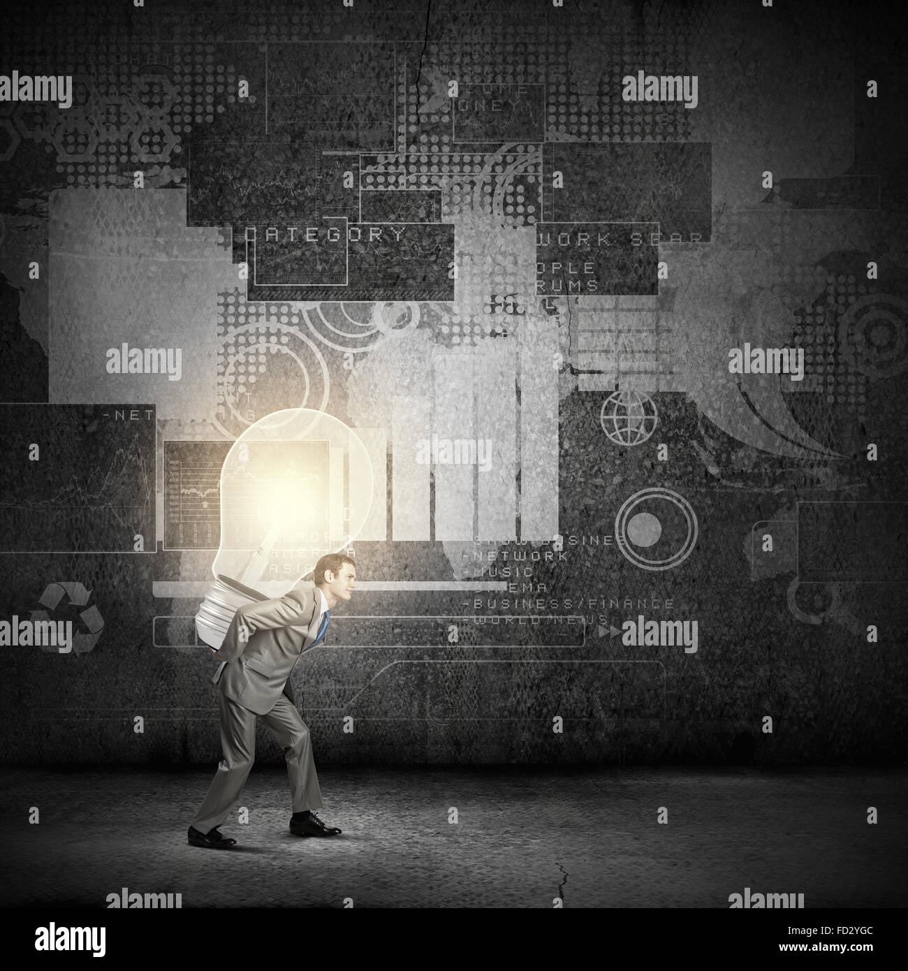 Young businessman carrying light bulb on back Stock Photo - Alamy