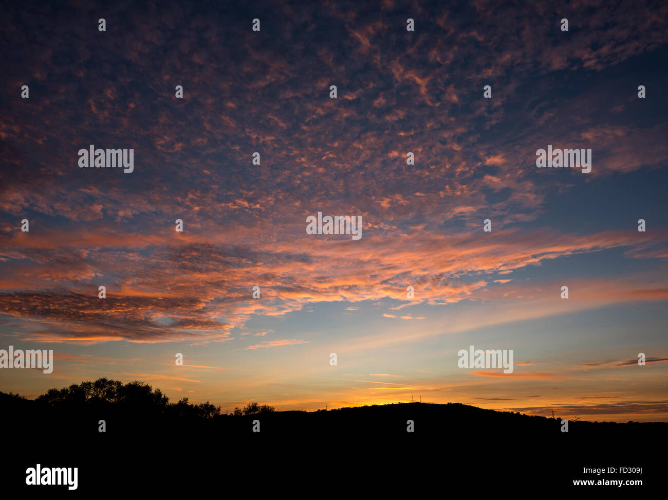 A beautiful september sunset with high wispy clouds catching the last ...