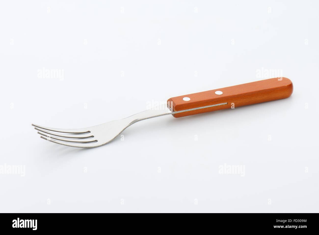dinner fork with wooden handle Stock Photo - Alamy