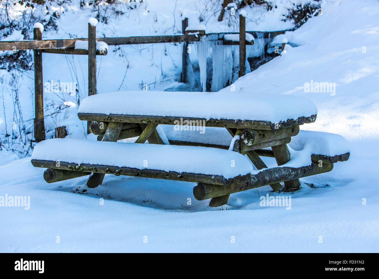 Park bench, picnic table, covered with snow, Sauerland area, Germany ...