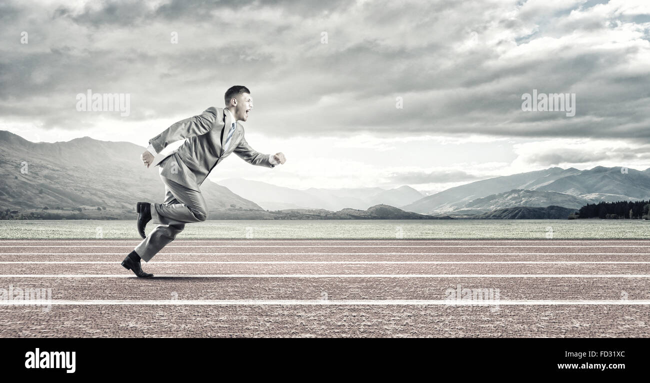 Worker on running track hi-res stock photography and images - Alamy