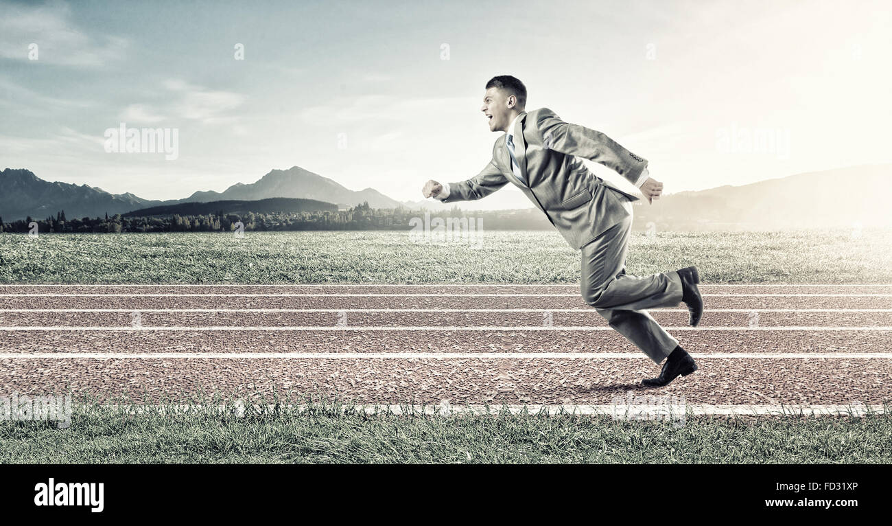 Worker on running track hi-res stock photography and images - Alamy
