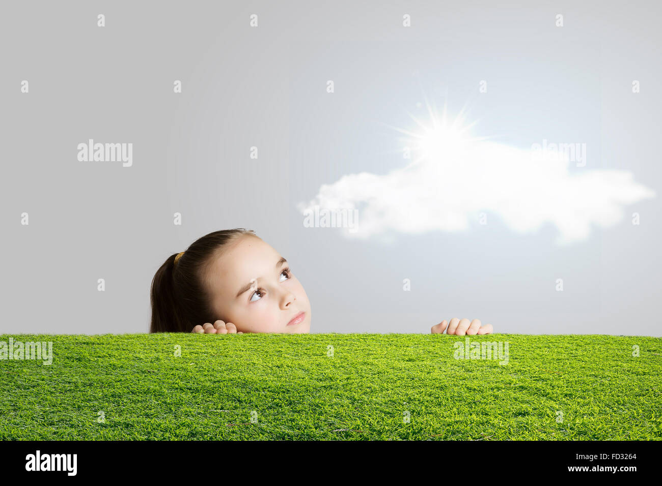 Little cute girl looking at shining sun Stock Photo - Alamy