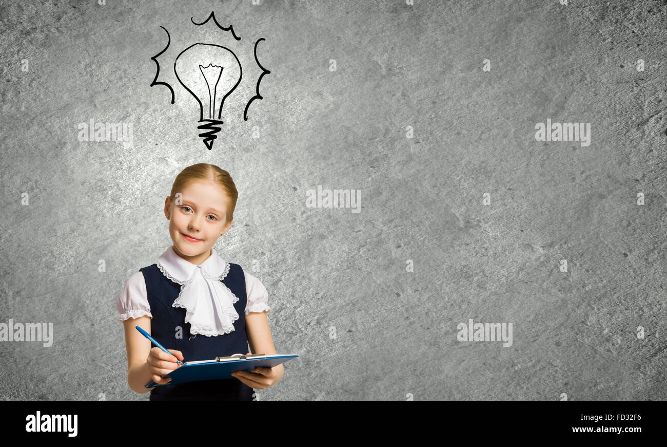 Cute schoolgirl and electrical bulb above head Stock Photo - Alamy