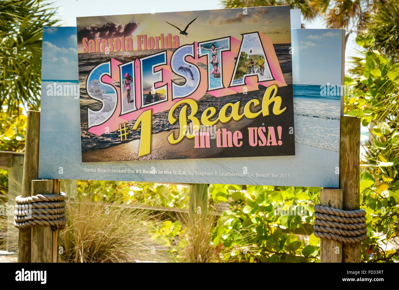 Siesta Key Beach, A colorful old postcard looking sign proclaims the ...