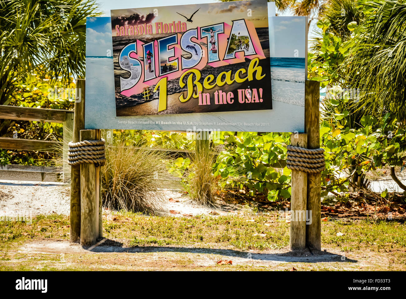 Siesta Key Beach, A colorful old postcard looking sign proclaims the ...