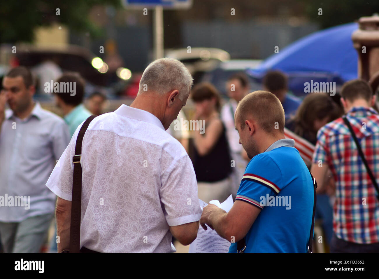 Two men back view hi-res stock photography and images - Alamy