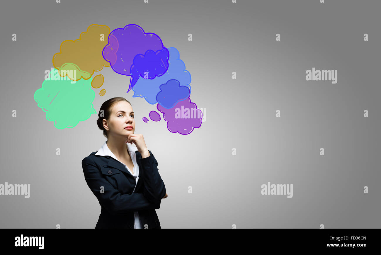Young attractive woman and colorful thoughts above her head Stock Photo ...