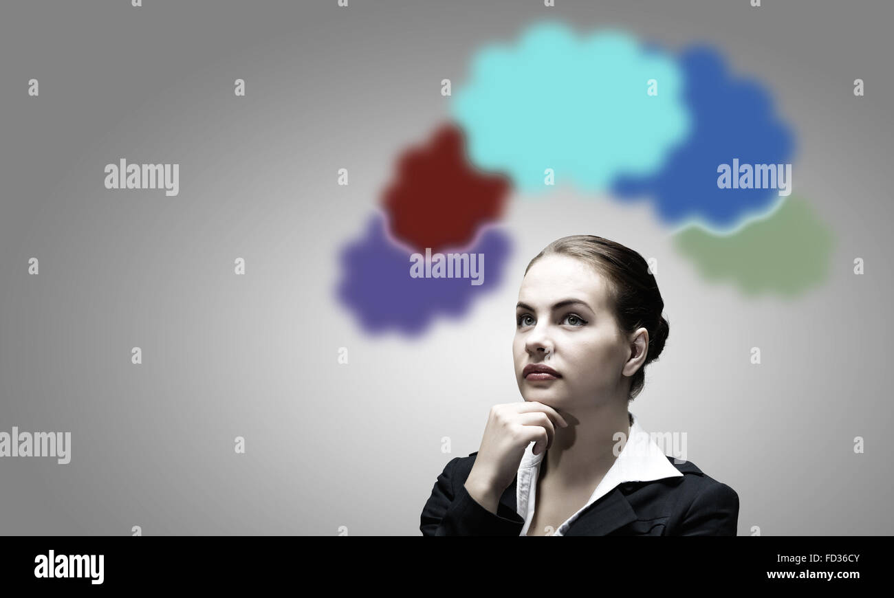 Young attractive woman and colorful thoughts above her head Stock Photo ...