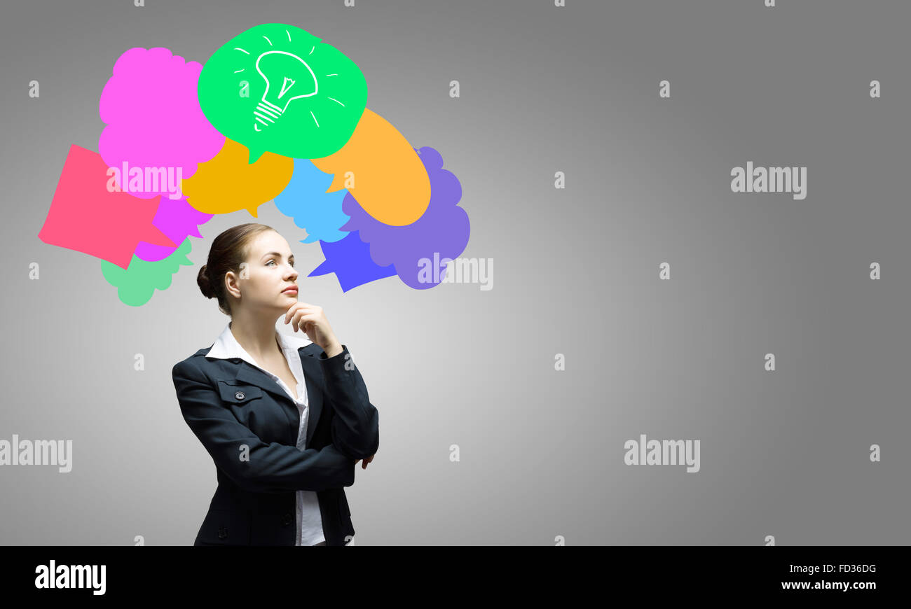 Young attractive woman and colorful thoughts above her head Stock Photo ...