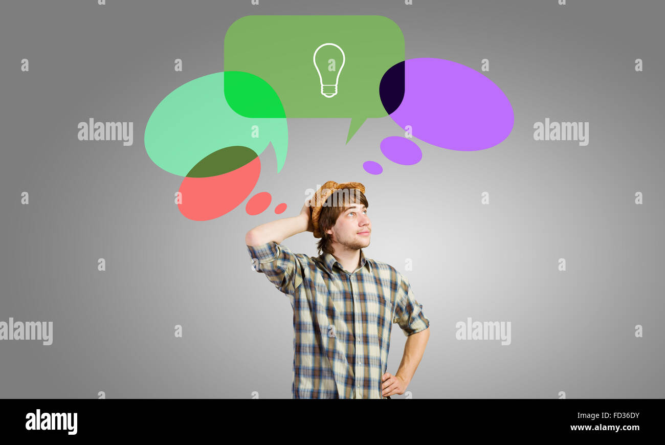 Young man and colorful thoughts above her head Stock Photo - Alamy