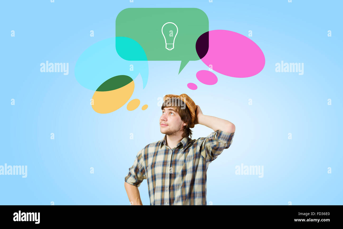 Young man and colorful thoughts above her head Stock Photo - Alamy