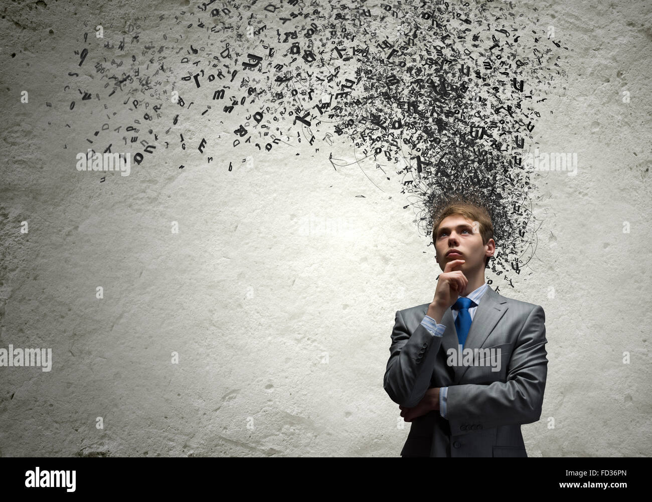 Young thoughtful businessman and thoughts above his head Stock Photo ...