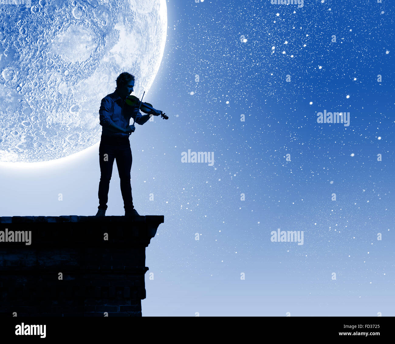 Young man playing violin at night under moon light Stock Photo - Alamy