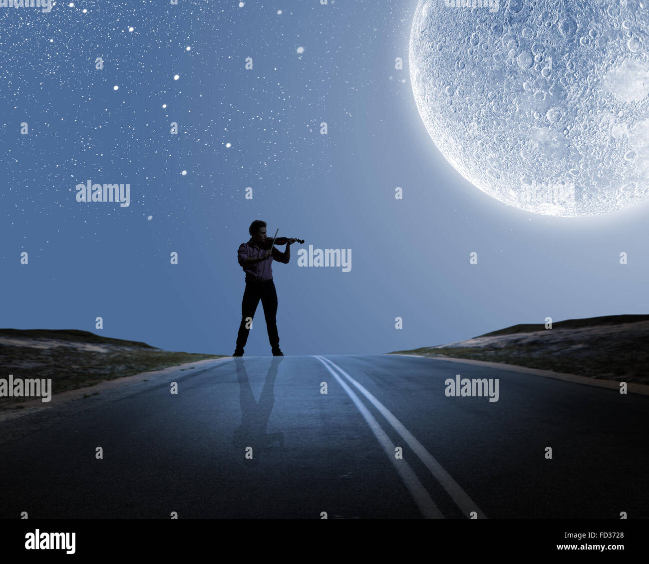 Young man playing violin night hi-res stock photography and images - Alamy