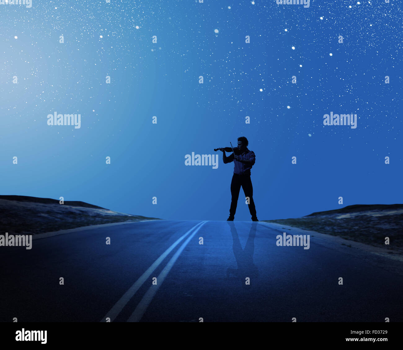 Young man playing violin night hi-res stock photography and images - Alamy