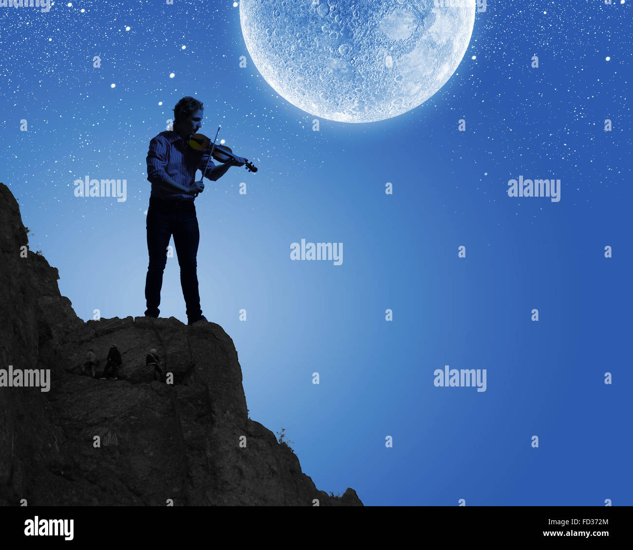 Young man playing violin at night under moon light Stock Photo - Alamy
