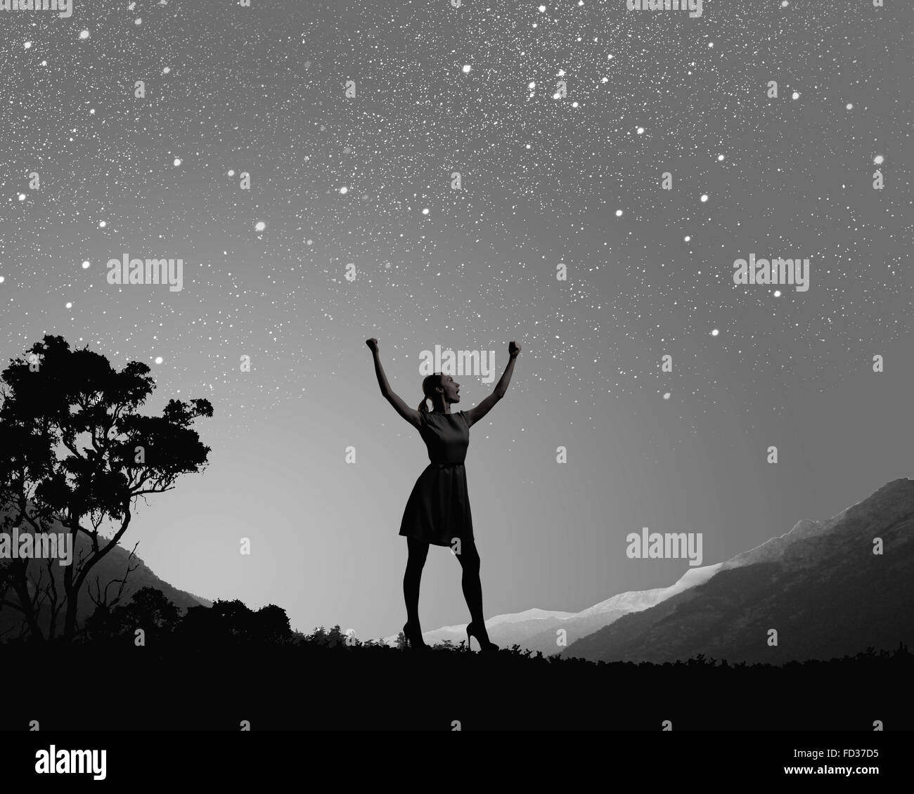 Silhouette of woman in dress at night with hands up Stock Photo - Alamy