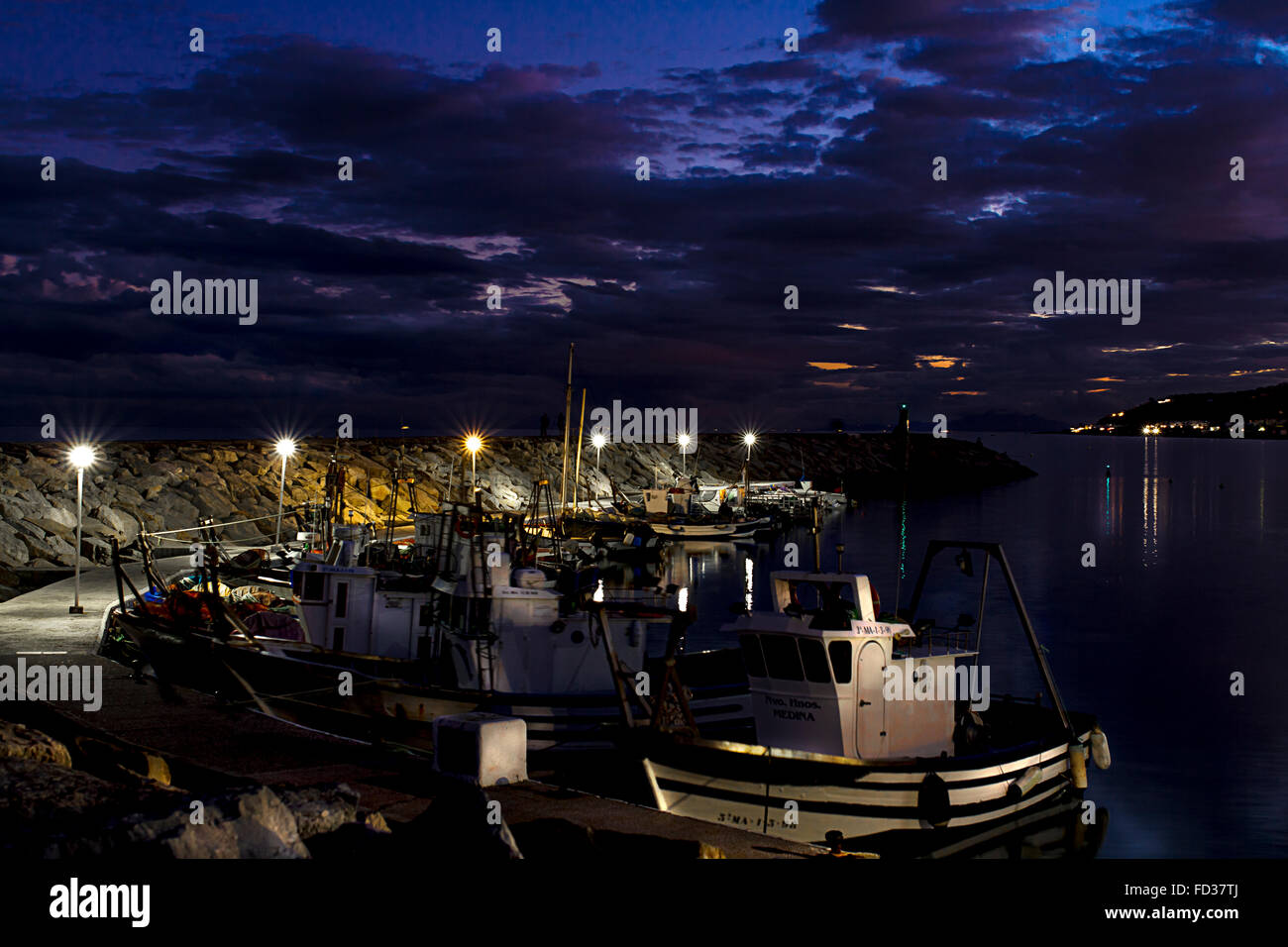Jetty port at night Stock Photo - Alamy
