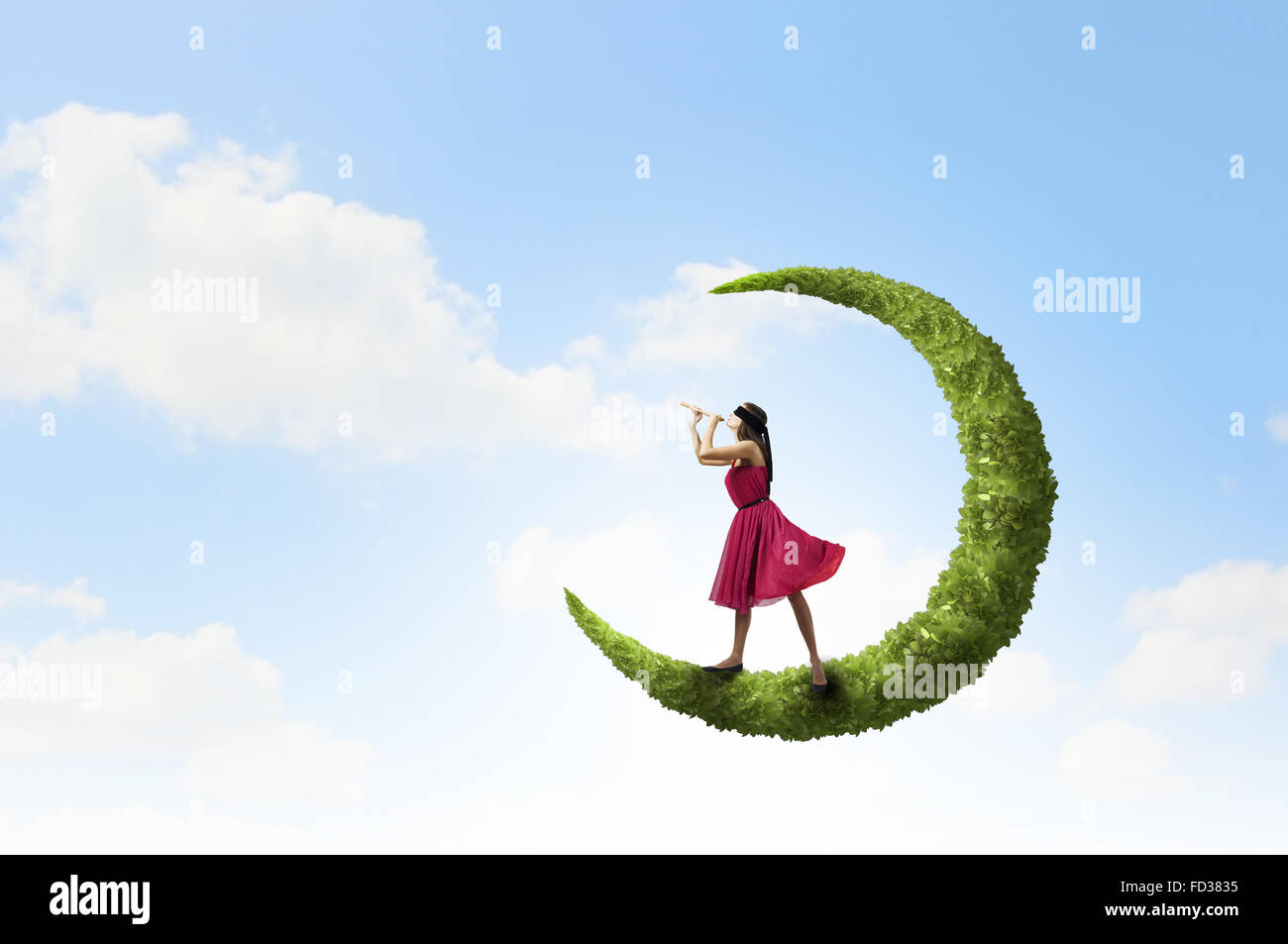 Young woman in red dress playing flute Stock Photo - Alamy