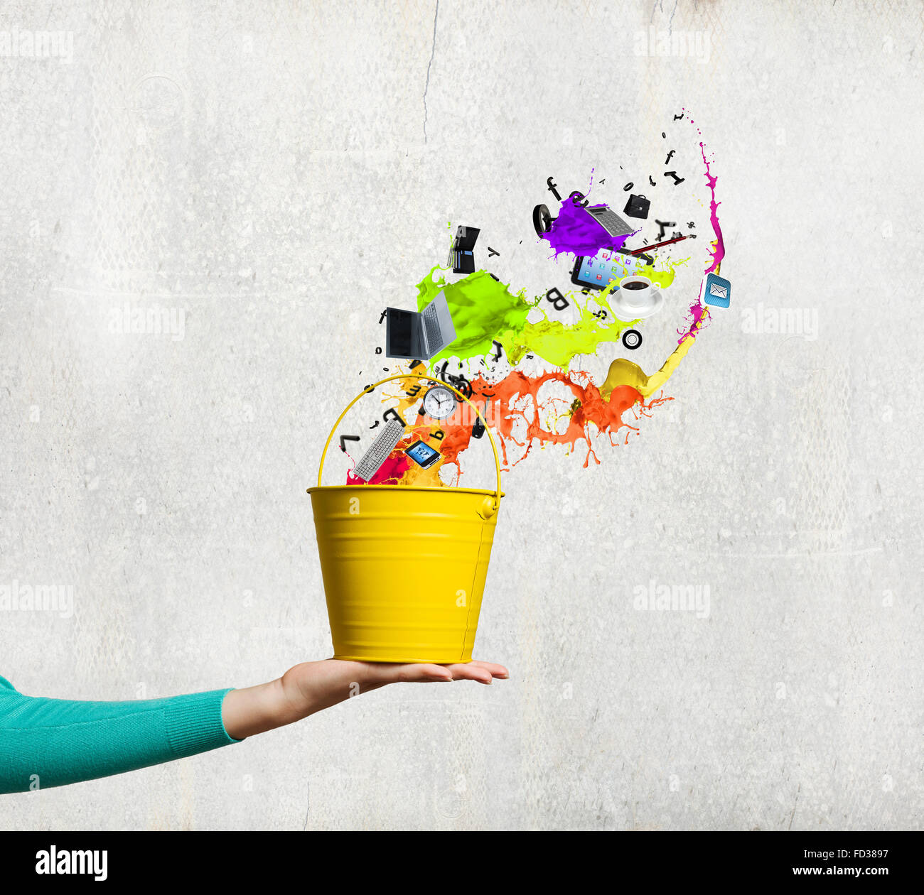 Close up of woman hand holding bucket with colorful splashes Stock ...