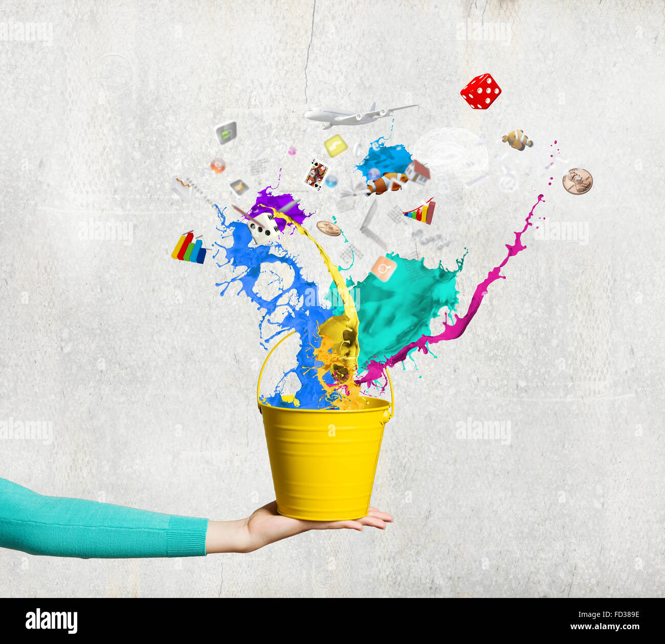 Close up of woman hand holding bucket with colorful splashes Stock ...