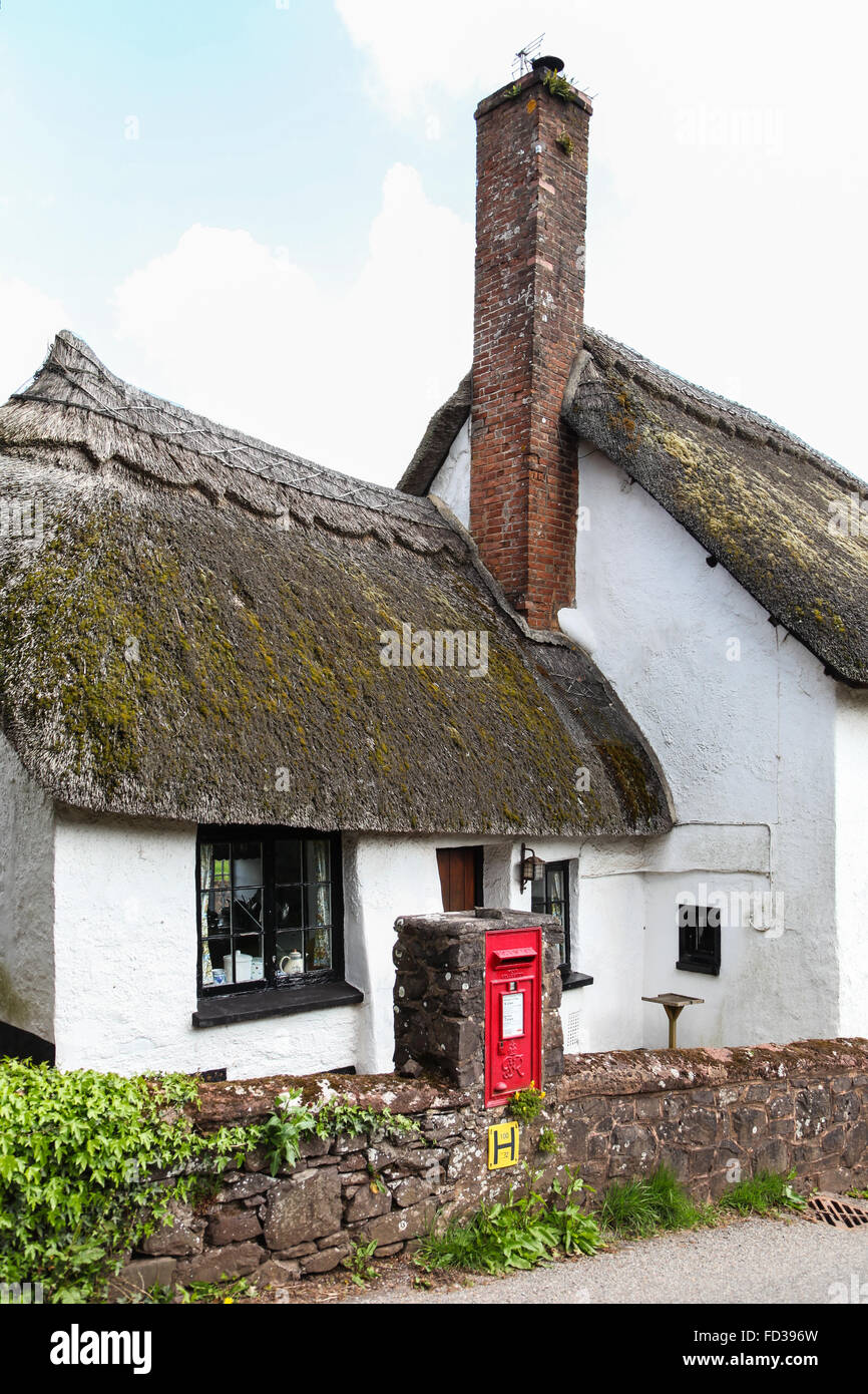 Dunchideock, Devon, UK, Traditional thatched cottage red mail letter ...