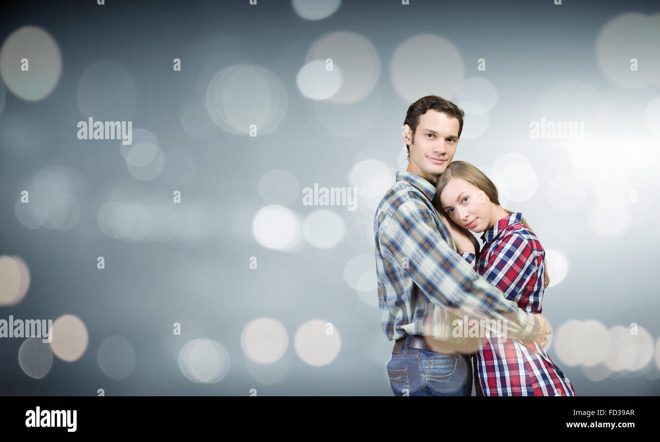 Young happy couple hugging each other Stock Photo - Alamy
