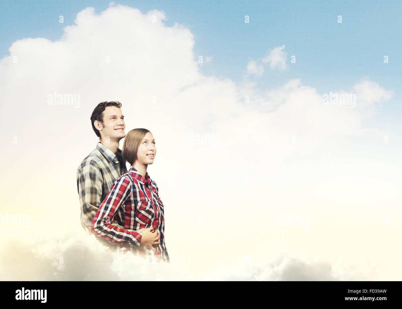 Young happy couple hugging each other Stock Photo - Alamy