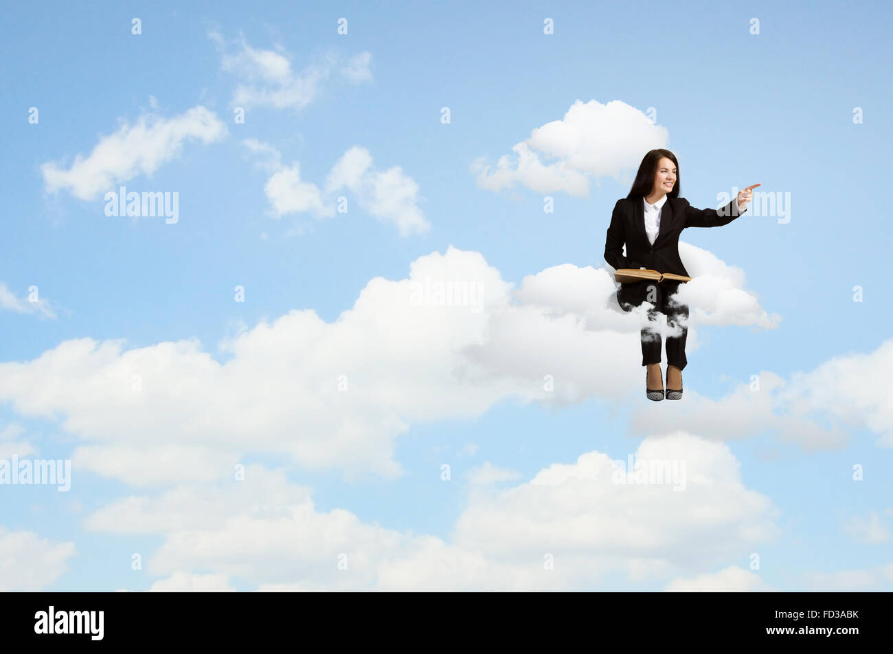 Young pretty lady with book in hands Stock Photo - Alamy