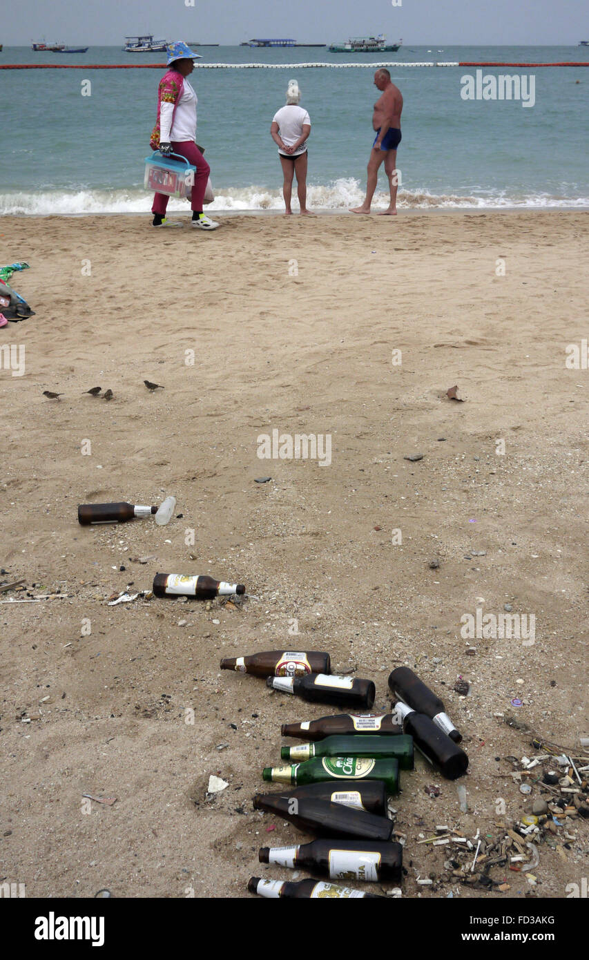 Empty beer bottles left abandoned littering the beach in Pattaya ...