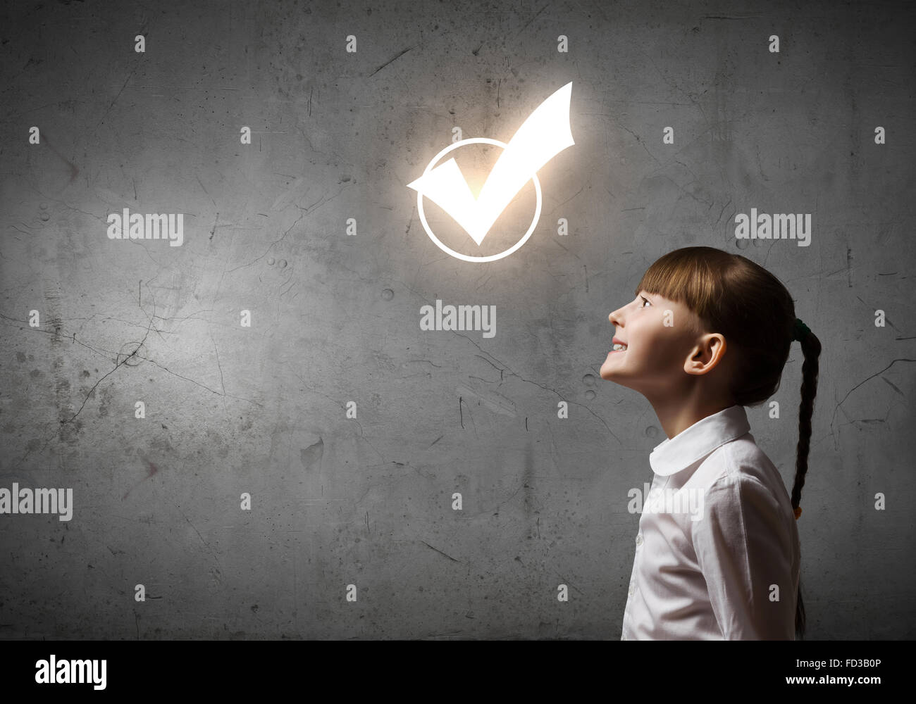 Side view of cute girl looking at tick Stock Photo - Alamy