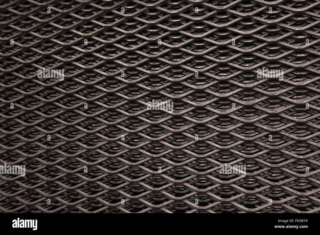 Stack of industrial steel grids with several layers of grids visible ...