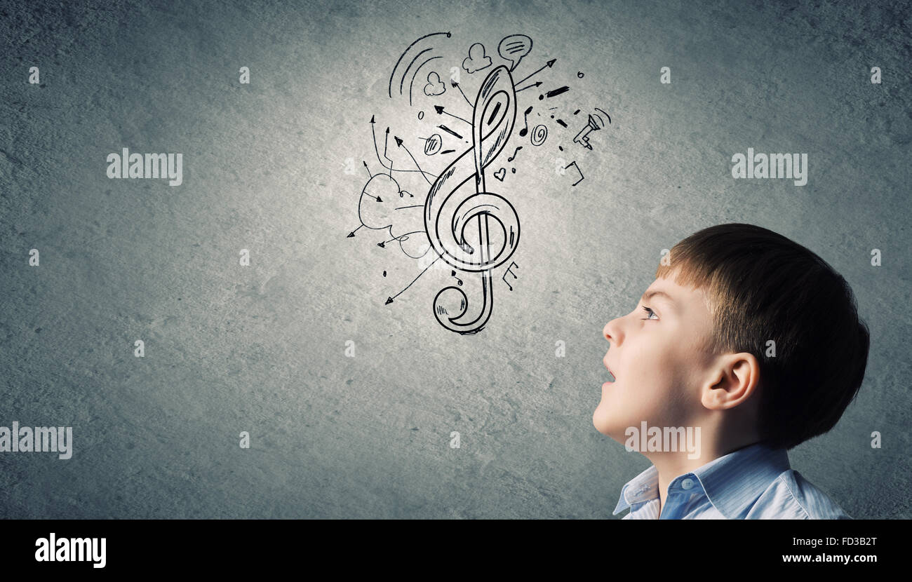 Colorful music symbol and cute boy singing Stock Photo - Alamy
