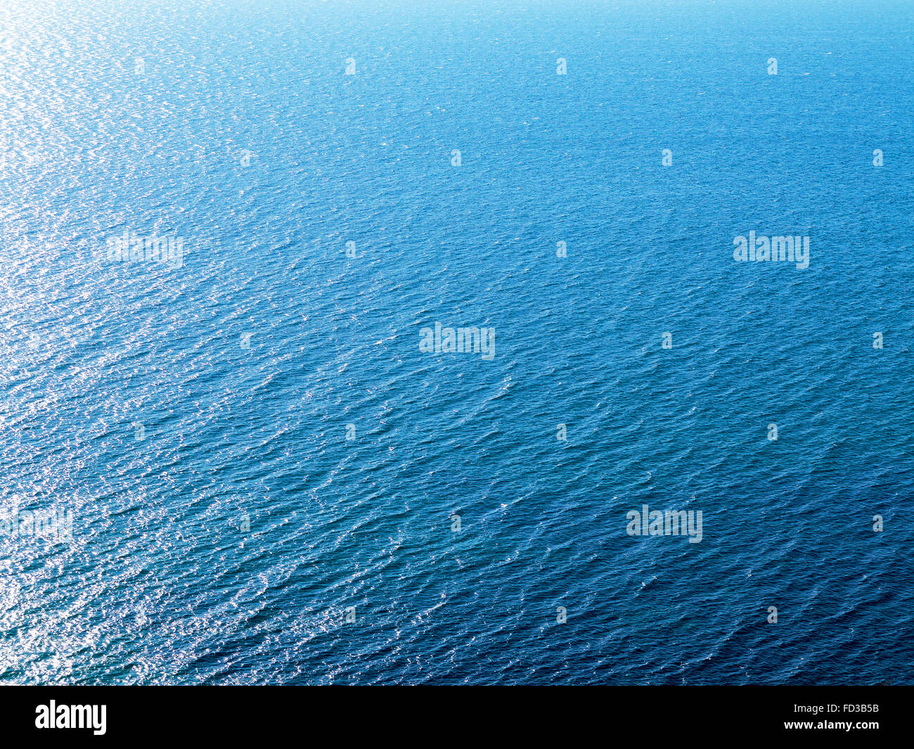 Blue landscape background sea surface backlit morning light of the ...
